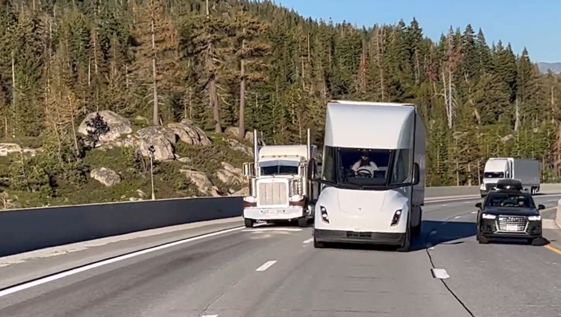 Unbelievable video shows Tesla electric semitruck go head-to-head with ...
