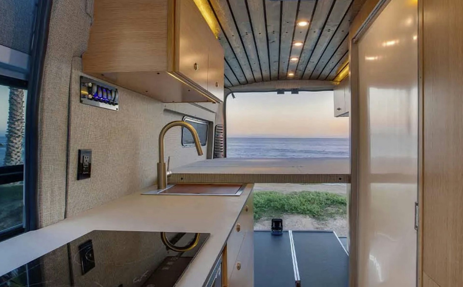 Automakers release fully electric camper van that can charge itself ...