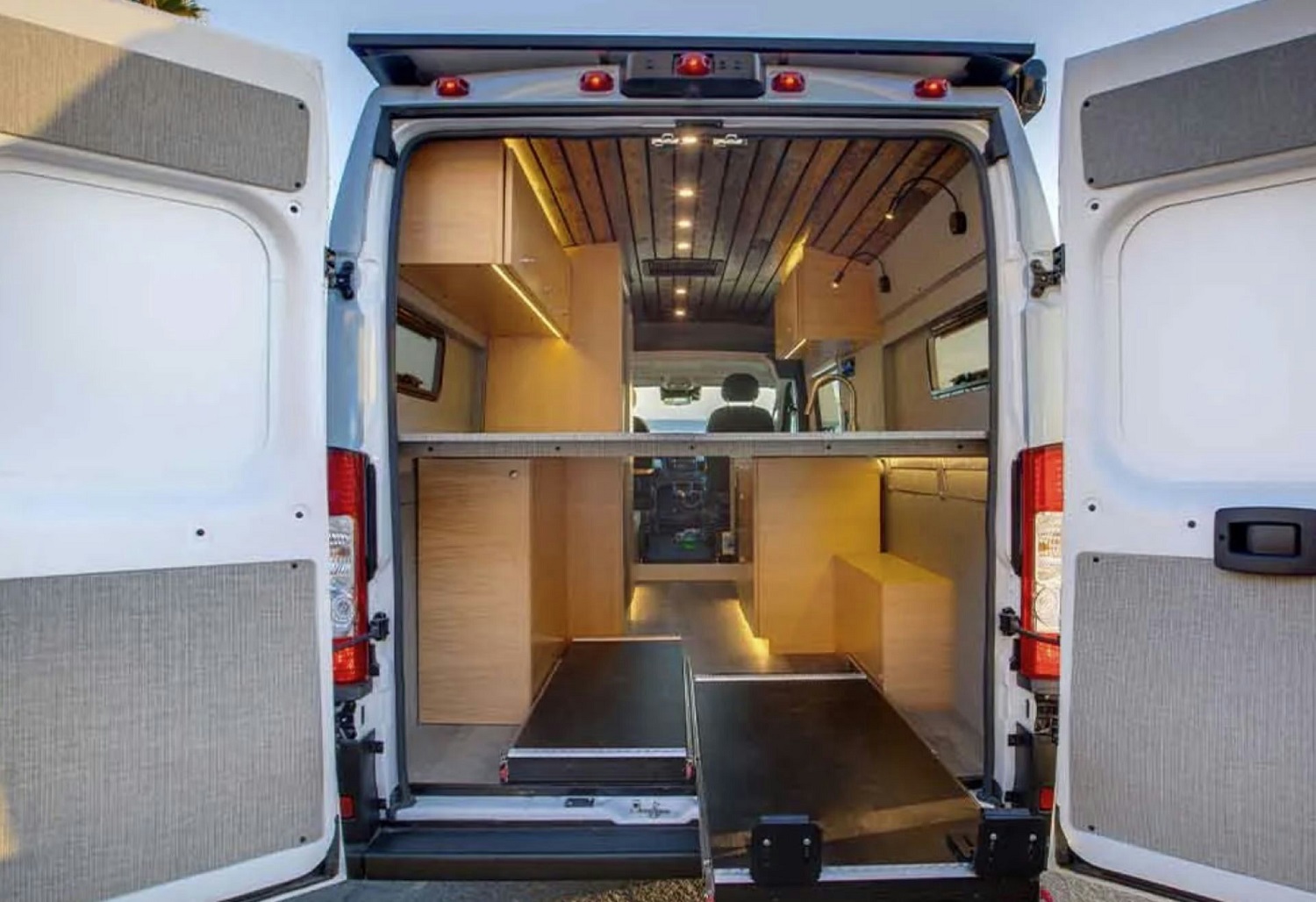 Automakers release fully electric camper van that can charge itself ...