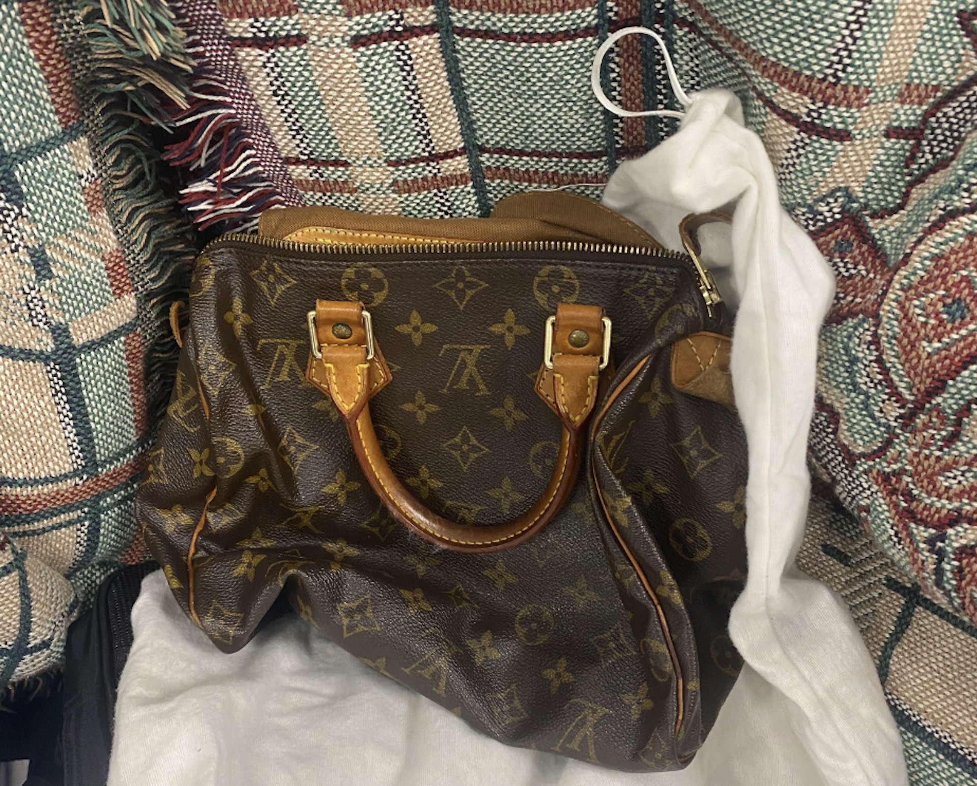 Thrifter finds 'score of the century' inside dust bag at local Goodwill ...