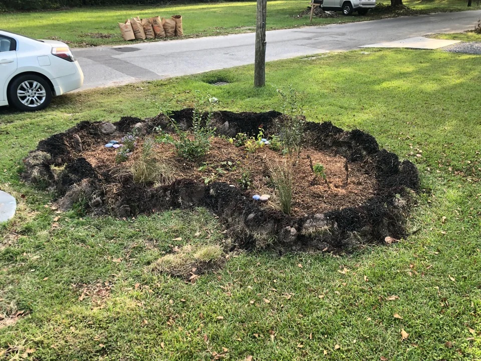 Homeowner shares creative solution to prevent flooding in front yard ...