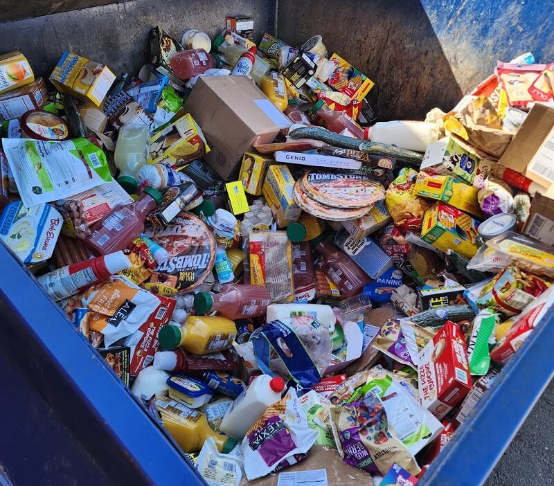 Employee shares photo of dumpster filled with food outside warehouse ...