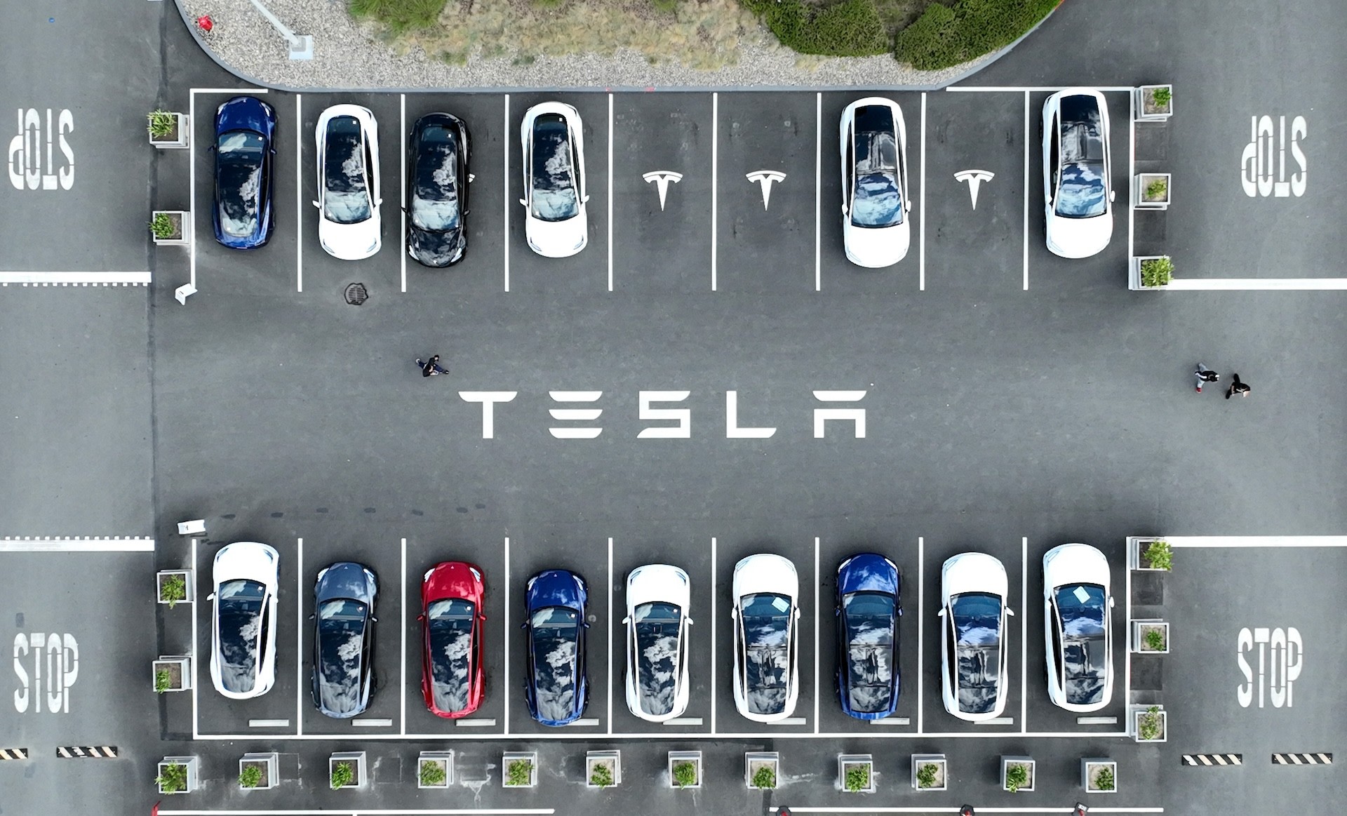 How Tesla layoffs affect America's EV charging station expansion ...