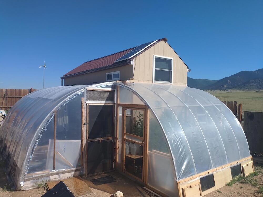 Off-grid tiny home owner wows with stunning greenhouse: 'It takes about ...
